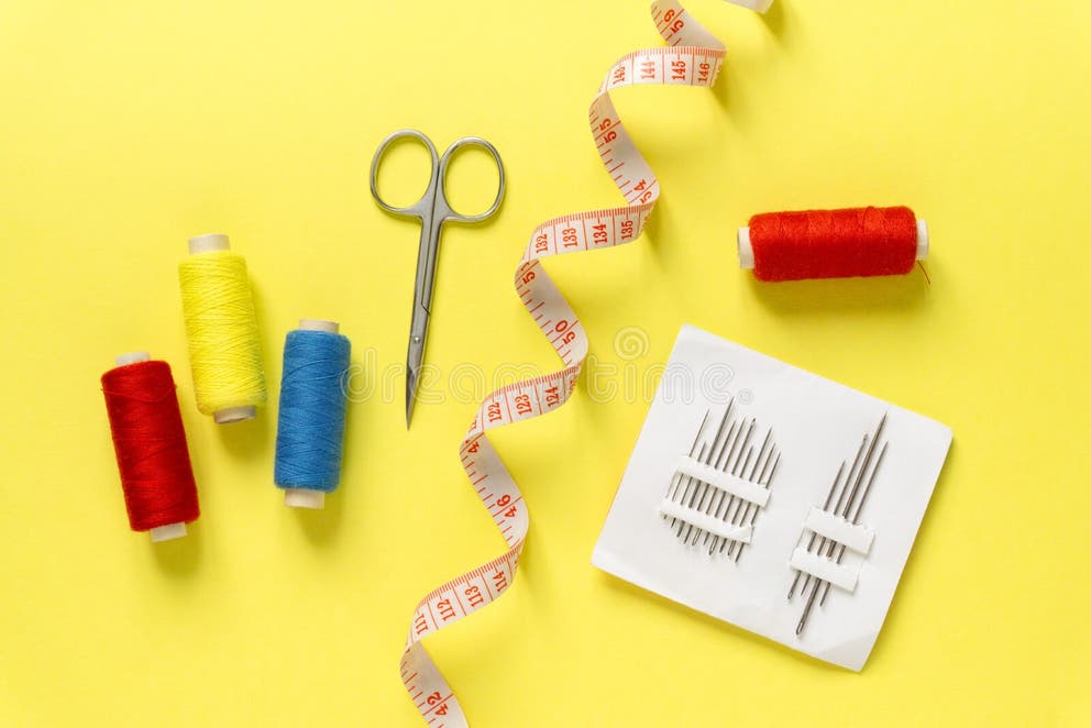 Flat Lay of Sewing Accessories. Threads, Needles, Centimeter and ...