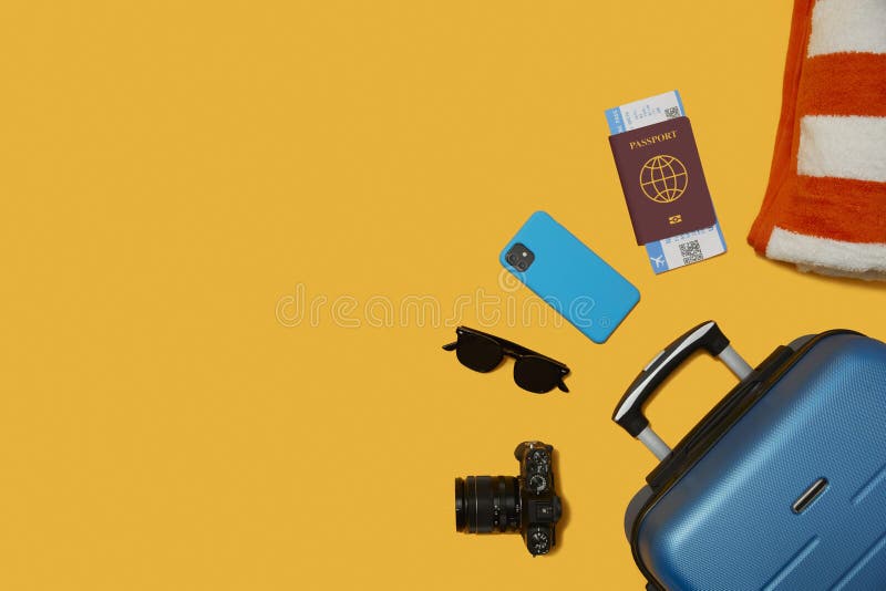 Flat Lay Shot of Blue Suitcase Unpacked with Holiday Accessories on ...