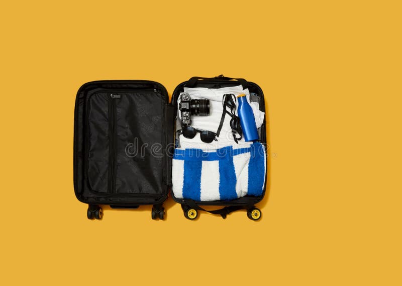 Flat Lay Shot of Open Suitcase Packed with Holiday Accessories on ...