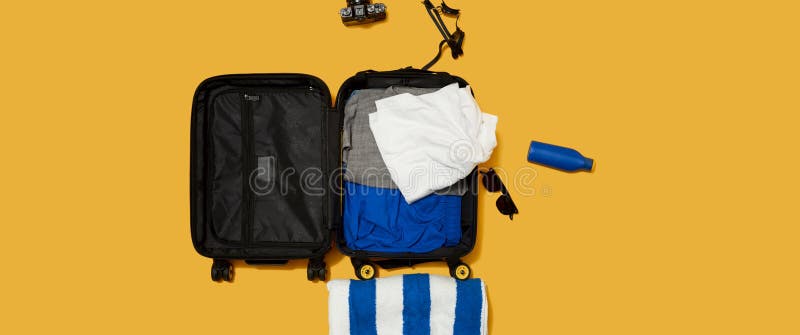Flat Lay Shot of Open Suitcase Packed with Holiday Accessories on ...