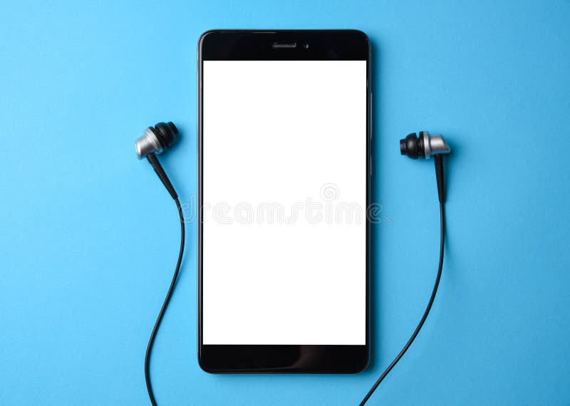 Flat Lay Smartphone, Tablet Phone with Headphones on a Blue Back Stock ...