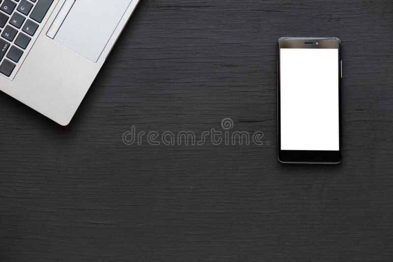 Flat Lay of Smartphone in White Screen and Part of Laptop Computer on ...