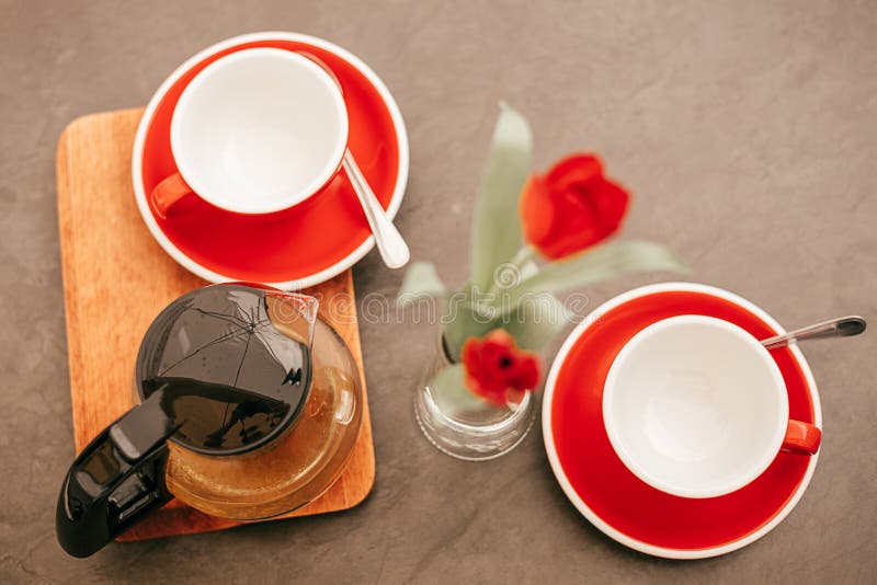 Flat Lay, Teapot with Tea and Two Red Empty Mugs on a Wooden Table ...