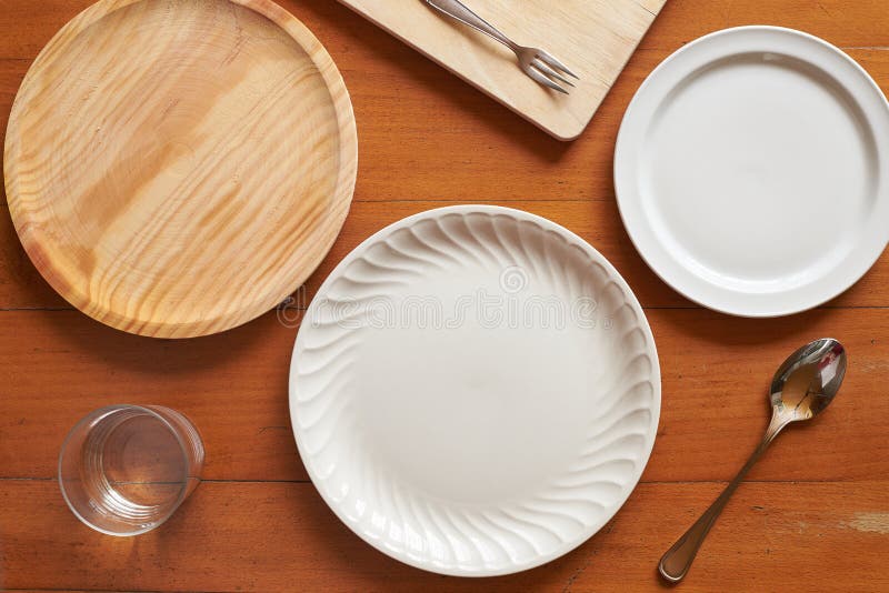 Flat Lay of Three Plates and Some Cutlery Stock Image - Image of ...