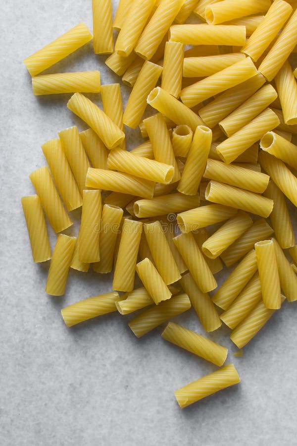 Flat Lay of Uncooked Tortiglioni Pasta Shells Stock Photo - Image of ...