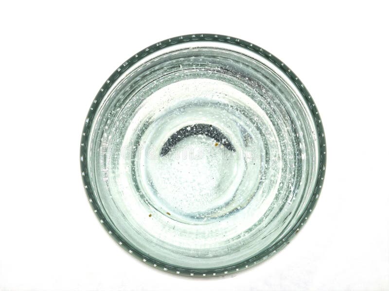 Flat Lay View of Clear Salt Solution in a Transparent Rounded Glass ...