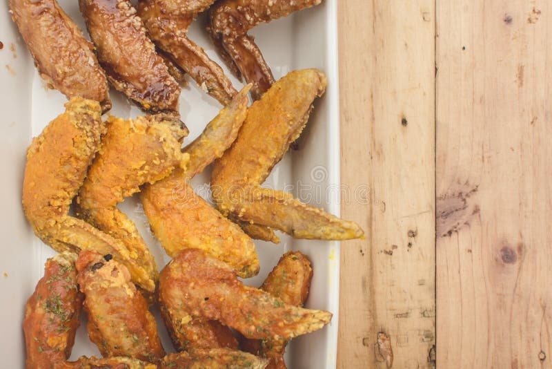 Flat Lay View of a Tray of Assorted Chicken Wings on a Wood Table Stock ...