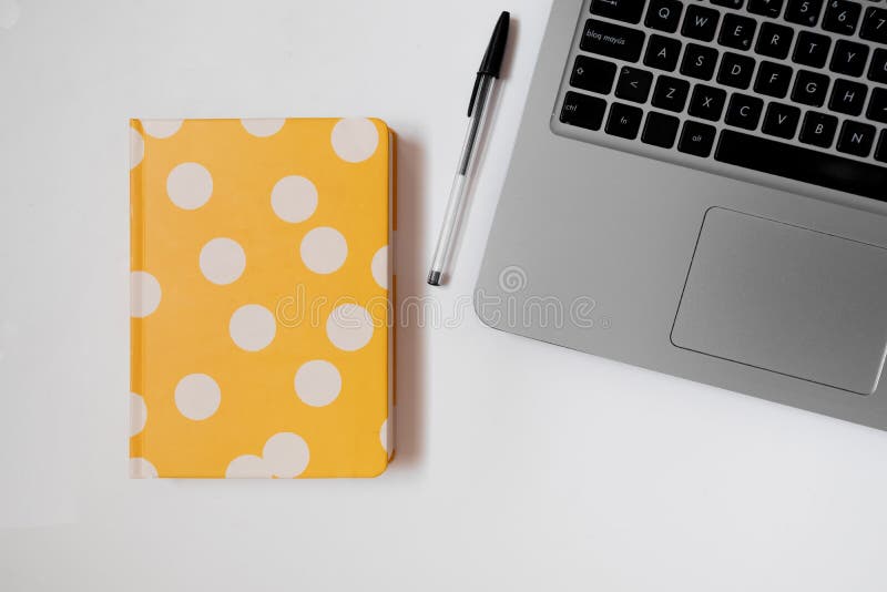 Flat Lay of a Yellow Journal and Laptop, Startup Business Stock Photo ...