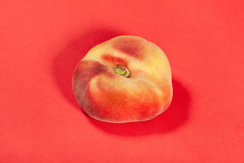 Flat peach on red stock image. Image of healthy, background - 241742823