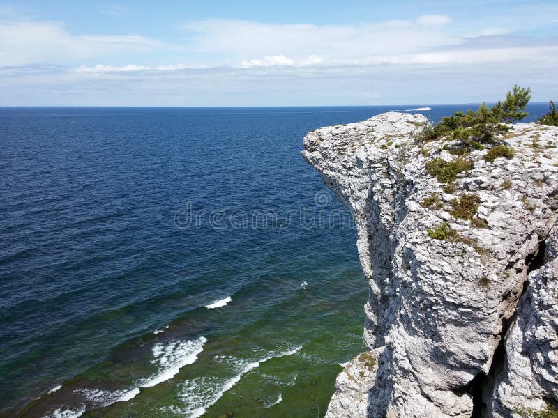 A flat rock at Gotland stock image. Image of rock, cloud - 58309635