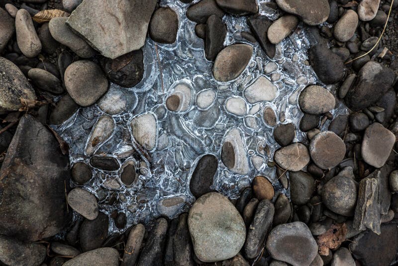 Flat Rounded Stones with Rocks Stock Photo - Image of nature, neutral ...