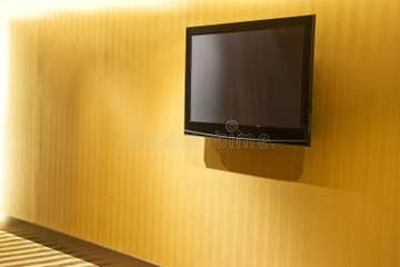 Flat Screen Television on Wall Stock Photo - Image of electronics ...