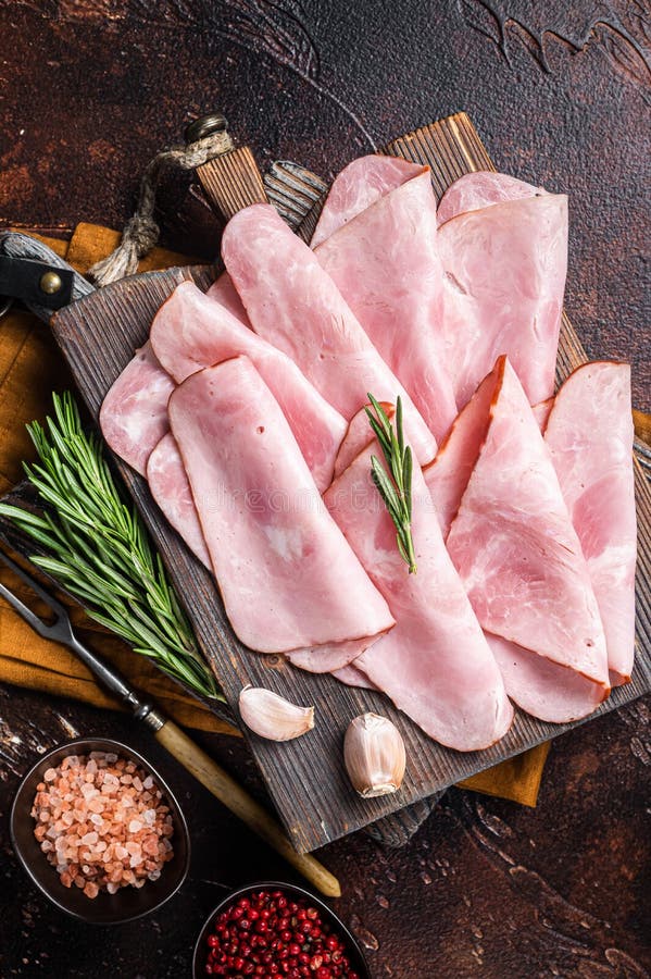 Flat Slices of Square Sandwich Ham with Herbs. Dark Background Stock ...