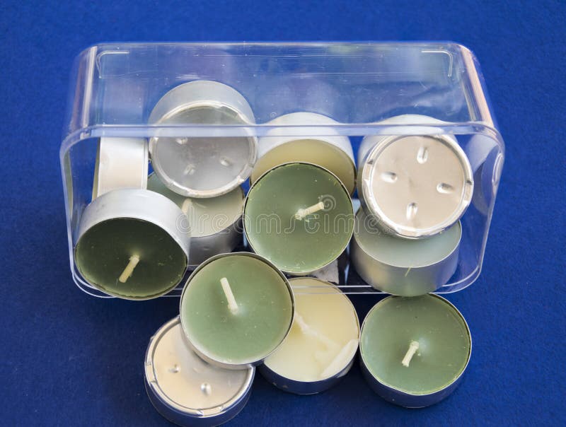 Candles stacked in a box. stock photo. Image of size - 121590044