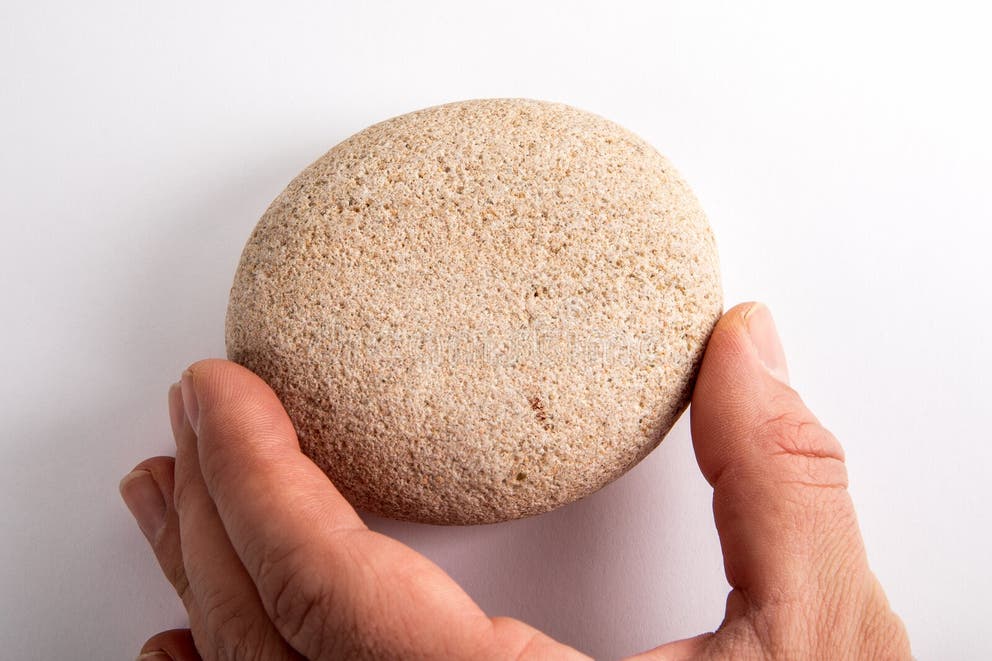 Flat Stone in Hand on White Background Stock Image - Image of ...