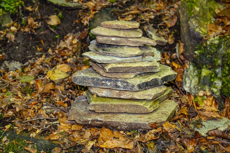 Stack of Stones Piled Up in Forest Setting Stock Image - Image of ...