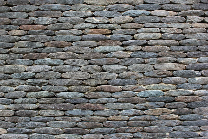 Flat stone slabs in a wall stock image. Image of architecture - 94309439