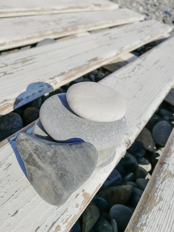 Flat Stones of Different Sizes on the Beach Stock Photo - Image of ...