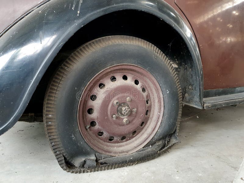 The Flat Tire on the Right Rear Wheel Stock Photo - Image of puncture ...
