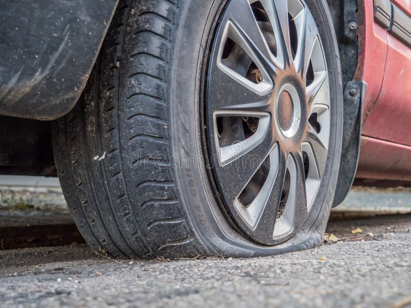 Flat tires on the car stock photo. Image of close, side - 194354842