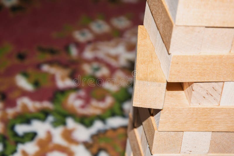 A Flat Tower Made of Wooden Blocks. Flat Rectangular Blocks Stock Image ...