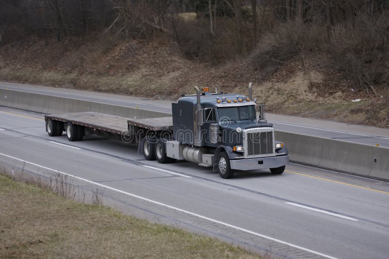 Flatbed Semi Truck On The Highway Stock Image - Image: 606371