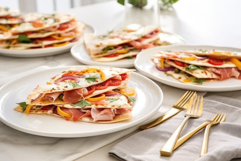 Flatbread Pizza Slices on White Plates with Forks and Napkins Stock ...