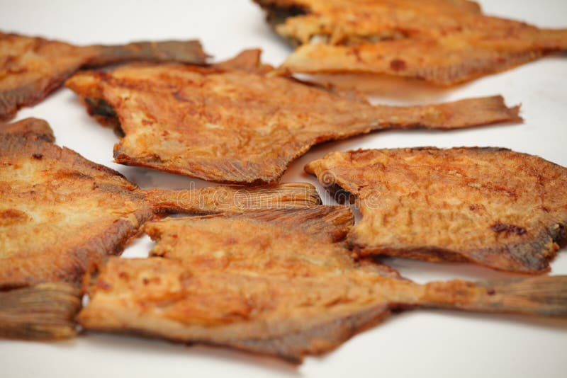 Fried Flounder Fish on White Plate with Lemon Stock Photo - Image of ...