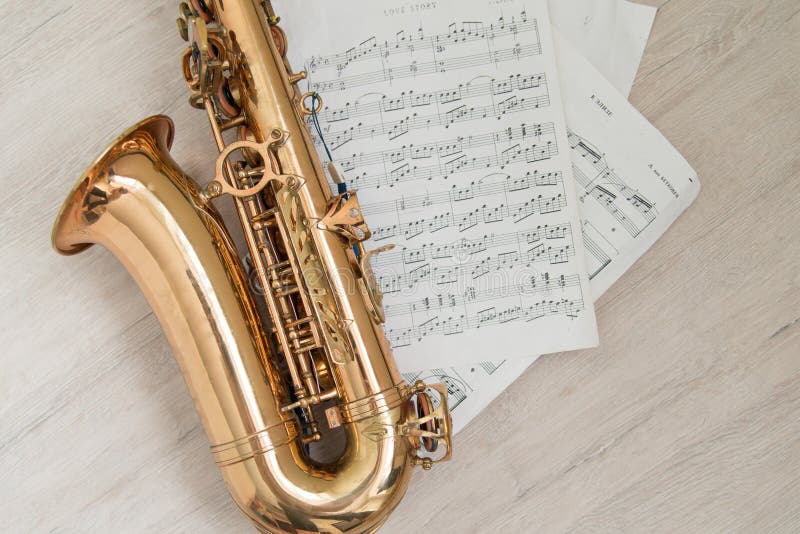 Flatlay Picture of the Saxophone Laying on the Note Sheets Stock Photo ...