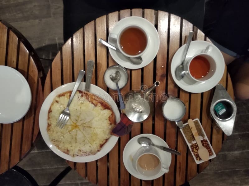 Flavoured Tea and Cheese Pizza Stock Image - Image of evening ...