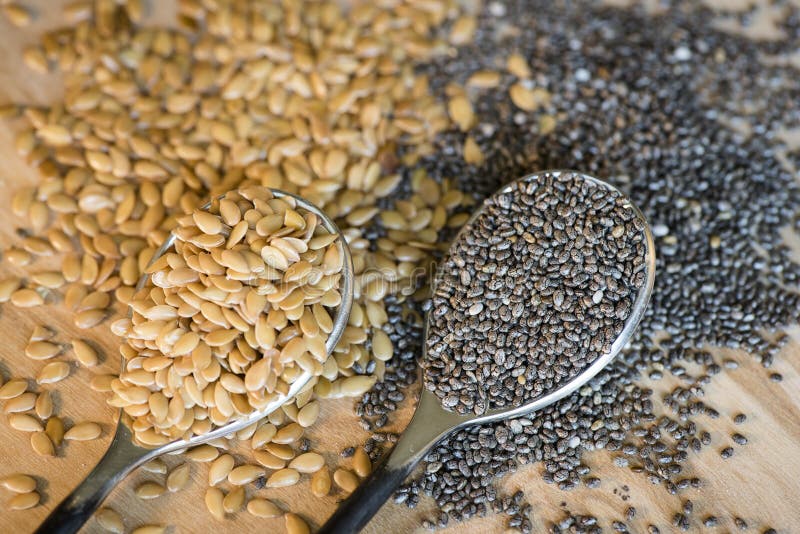 Flax and chia seeds stock photo. Image of healthy, spilling - 89587868