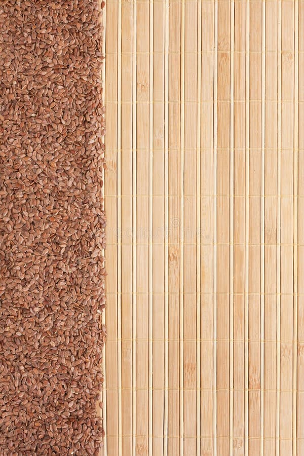 Flax seed on a bamboo mat stock image. Image of linseed - 40121767