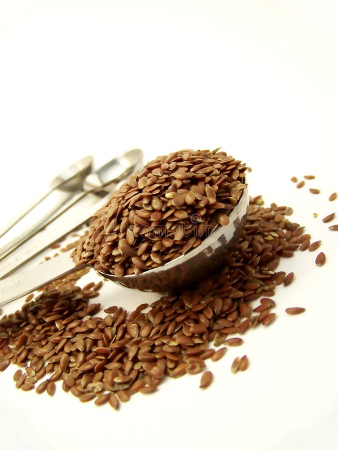 Flax Seed Overflowing Measuring Spoon, Angle Stock Image - Image of ...