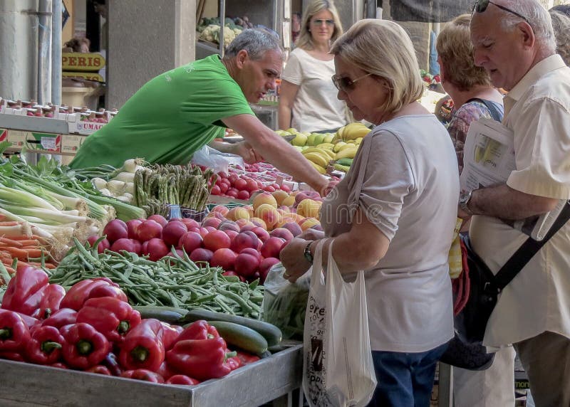 Flea Market Shoppers editorial stock image. Image of fresh - 73720234