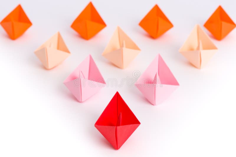 Fleet of Origami Paper Ships in Triangle Shape Isolated on White Stock ...