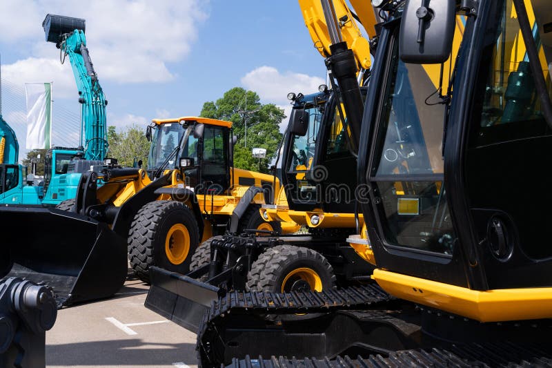 Fleet of Yellow Construction Machines Stock Photo - Image of shovel ...