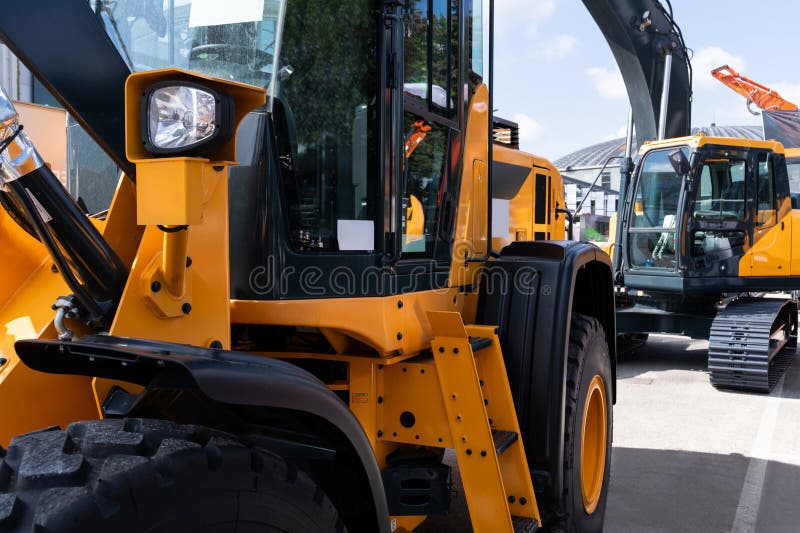 Fleet of Yellow Construction Machines Stock Photo - Image of bulldozer ...