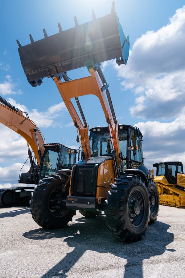 Fleet of Yellow Construction Machines. Stock Photo - Image of site ...