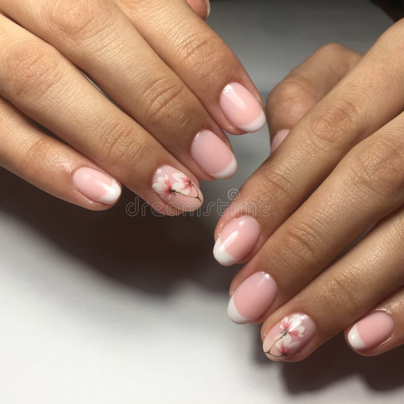 Flesh-colored Beautifull Manicure on Nails. Female Manicure Stock Photo ...
