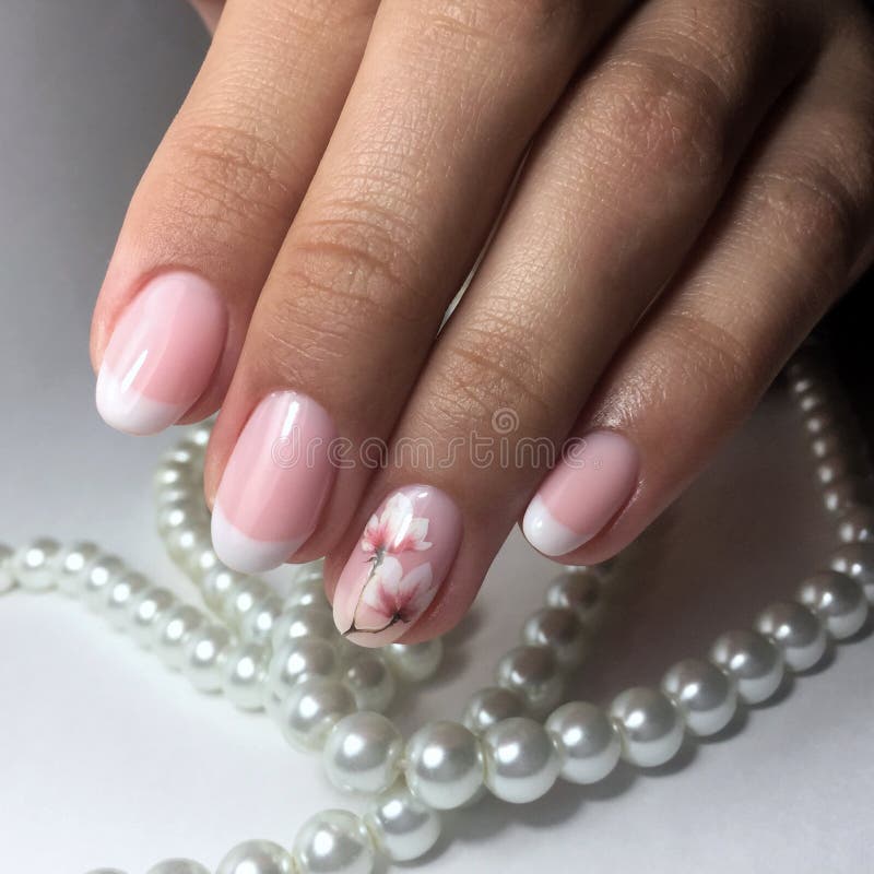 Flesh-colored Beautifull Manicure on Nails. Female Manicure Stock Image ...