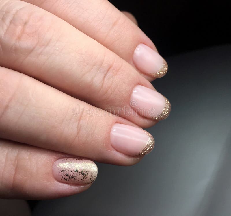 Flesh-colored Beautifull Manicure on Nails. Female Manicure Stock Image ...