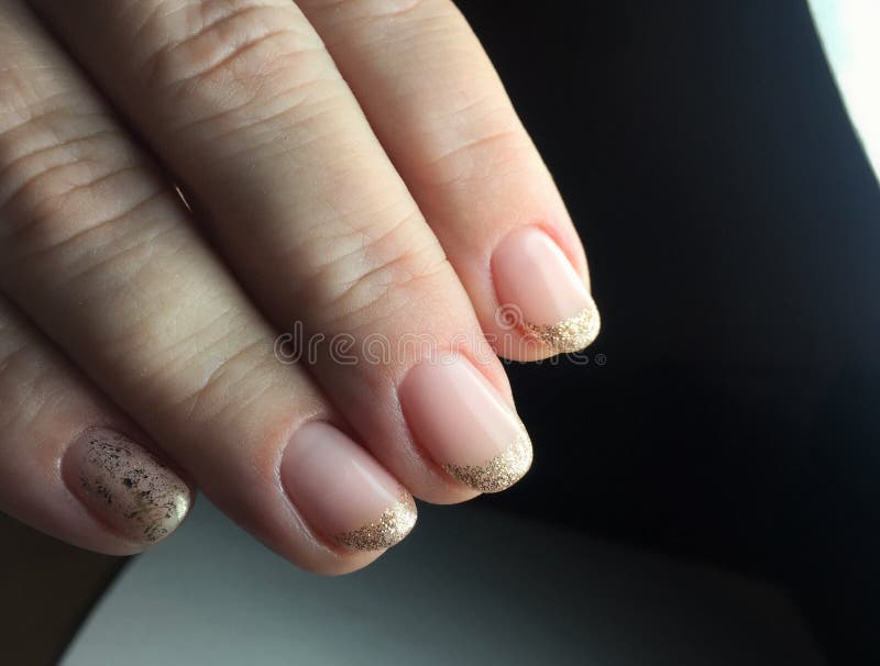 Flesh-colored Beautifull Manicure on Nails. Female Manicure Stock Photo ...