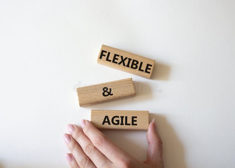 Flexible And Agile Symbol Concept Word Flexible And Agile On Wooden