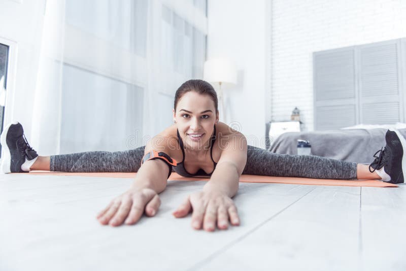 Delighted Nice Fit Woman Developing Her Flexibility Stock Image - Image ...
