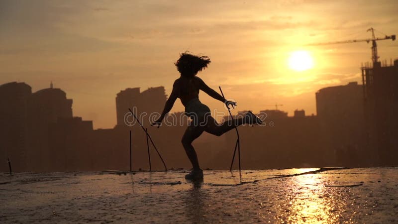 Flexible Female Gymnast Jumping Acrobatic Split Tricks with Reflection ...