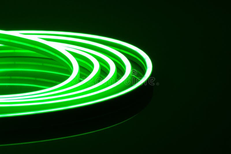 Flexible Green LED Neon Strip on Black Background Stock Image - Image ...