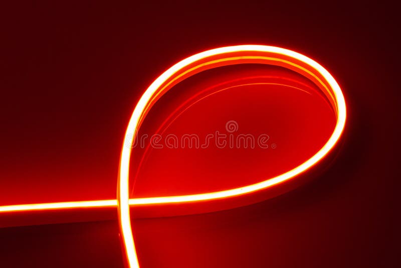 Flexible Orange LED Neon Strip on Black Background Stock Image - Image ...