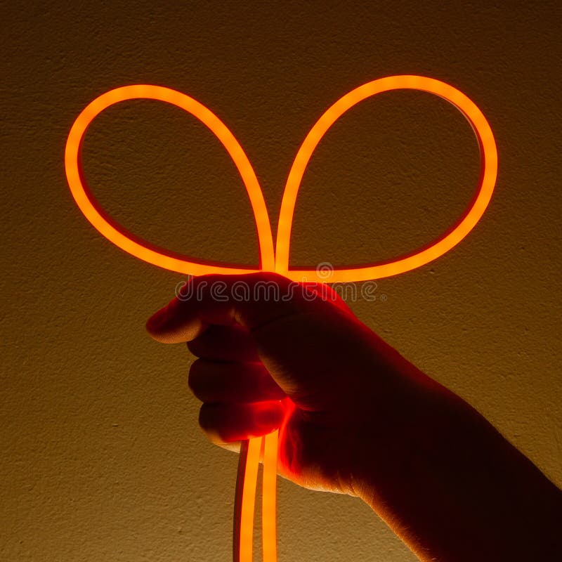 Orange LED Neon Light Strip Isolated on White Background Stock Photo ...