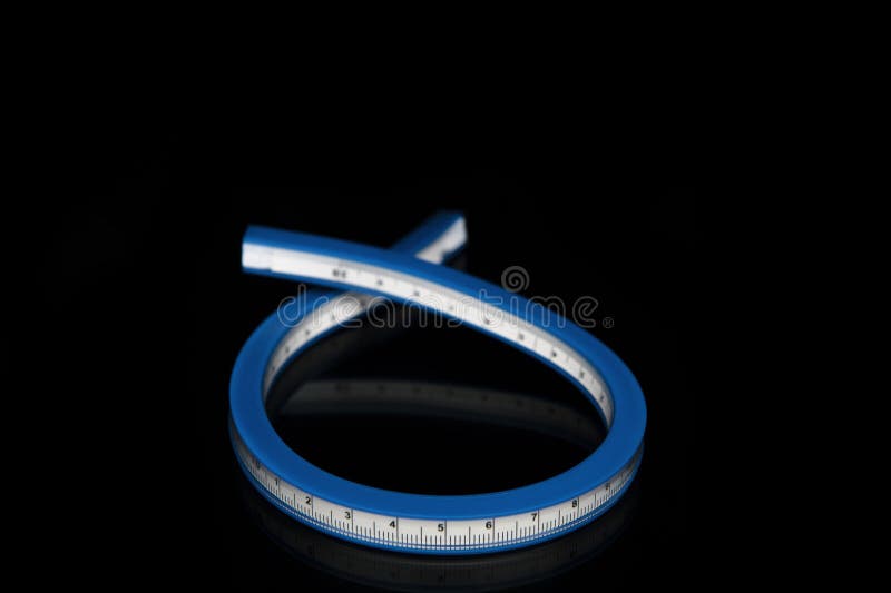 Flexible Ruler on a Black Background Stock Photo - Image of shape ...