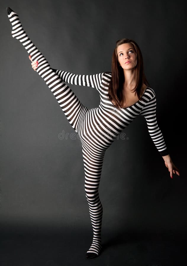 Flexible Woman in Striped Bodysuit Stock Photo - Image of bodysuit ...